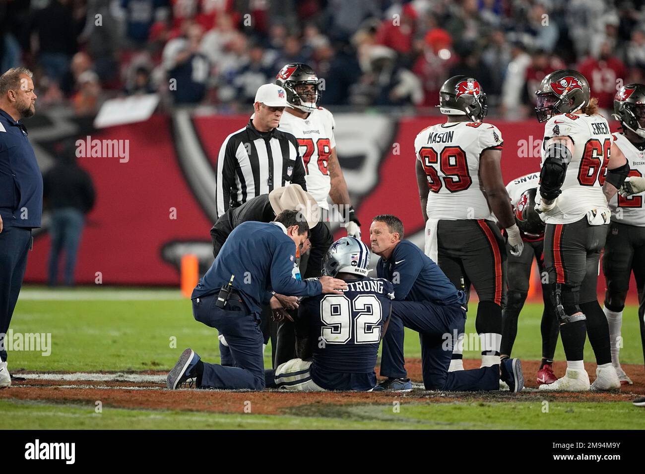 Dallas Cowboys defensive end Dorance Armstrong (92) is helped after ...