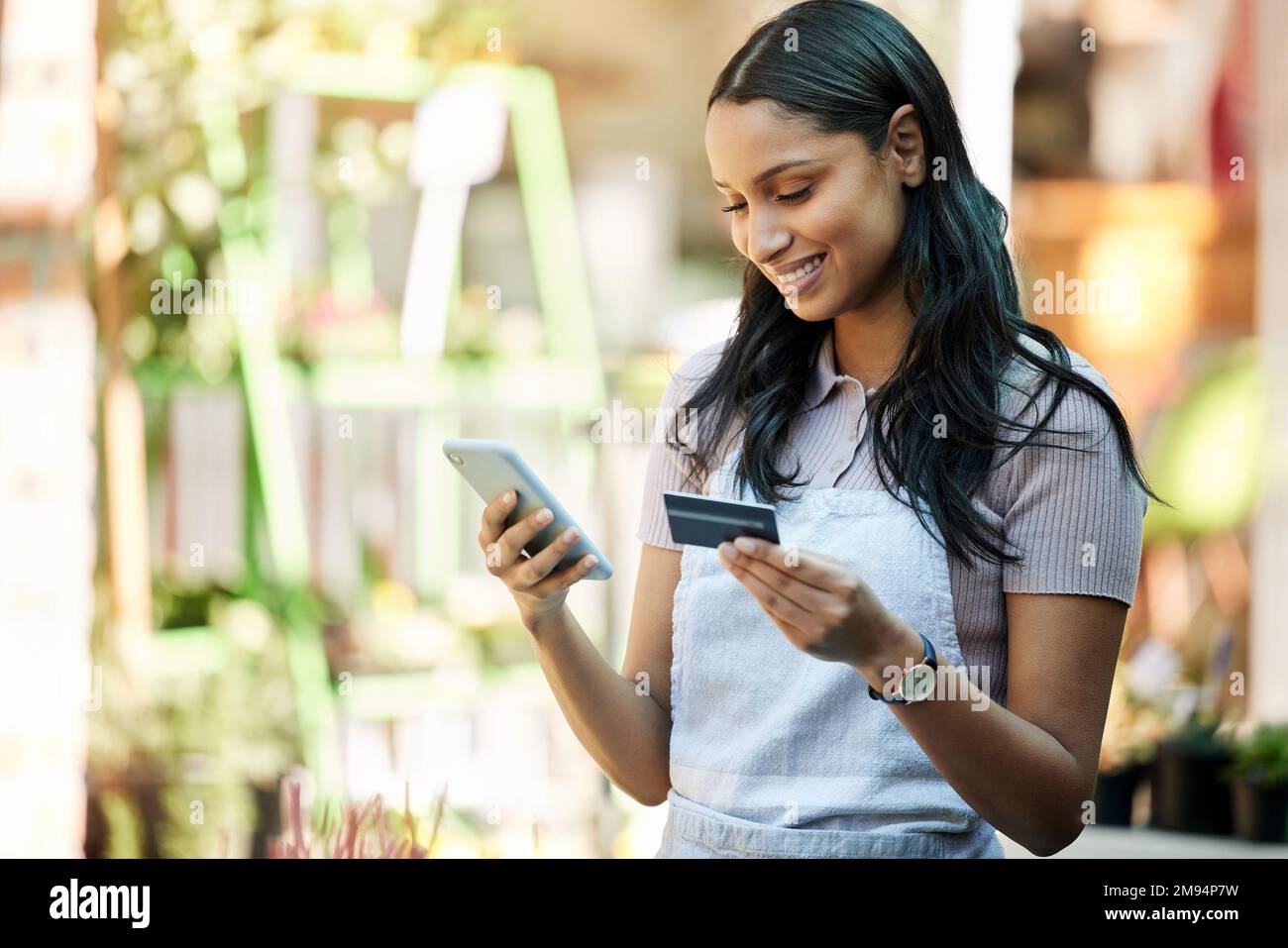 Young female business owner hi-res stock photography and images - Alamy
