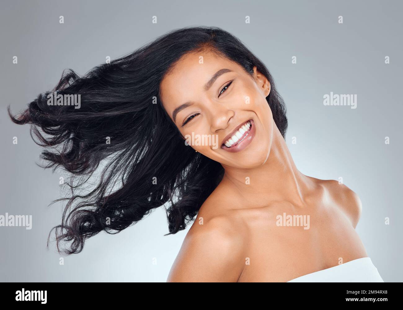 Hair goals on fleek. Studio portrait of an attractive young woman ...