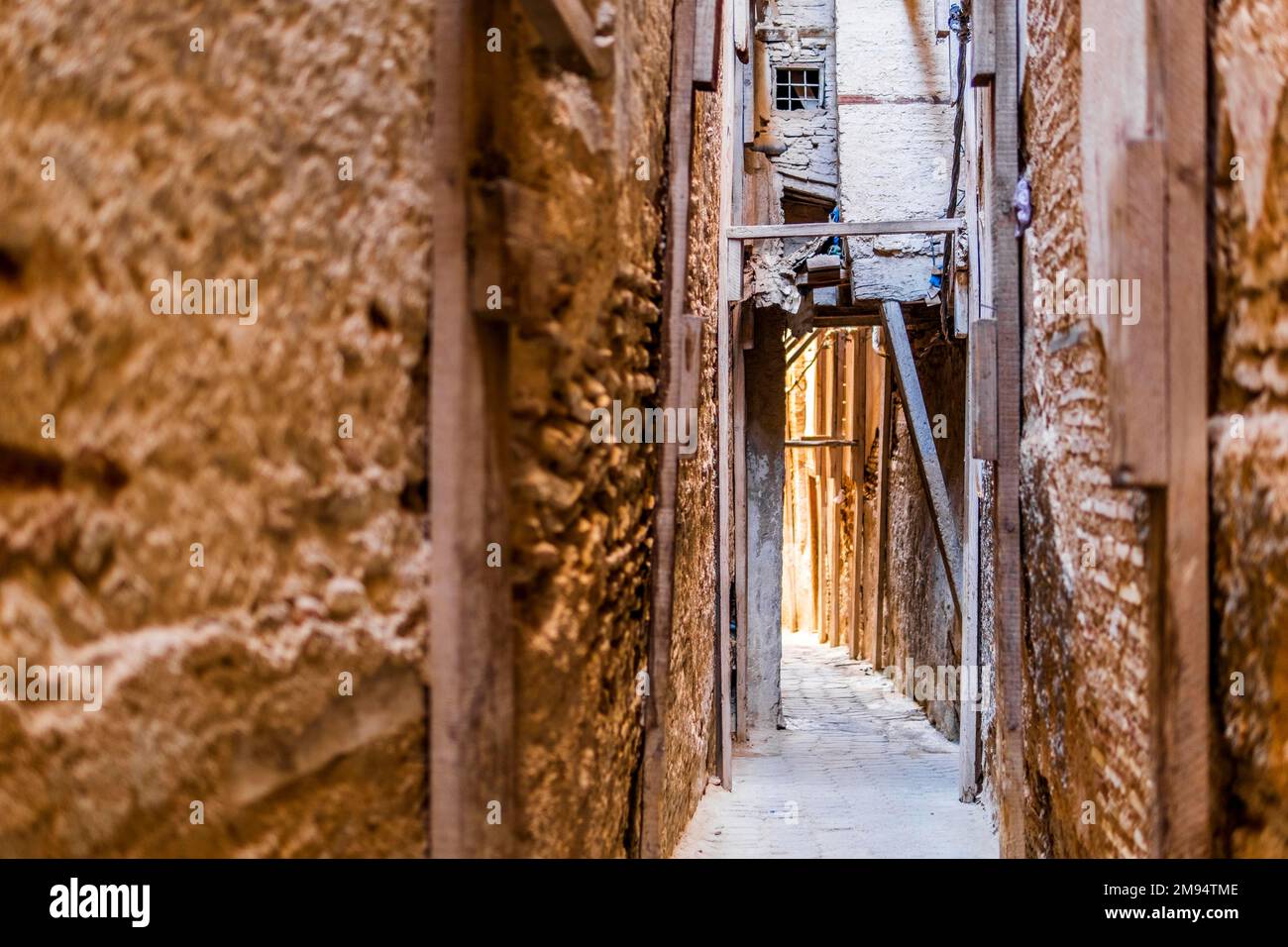Narrow street of Arabic old town called medina in Fes, Morocco, North ...