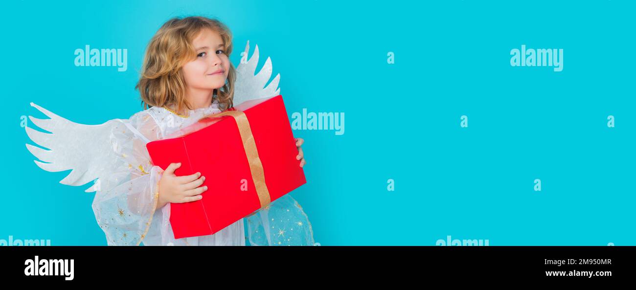 Kid boy angel with gift box present. Valentines day. Little cupid angel ...