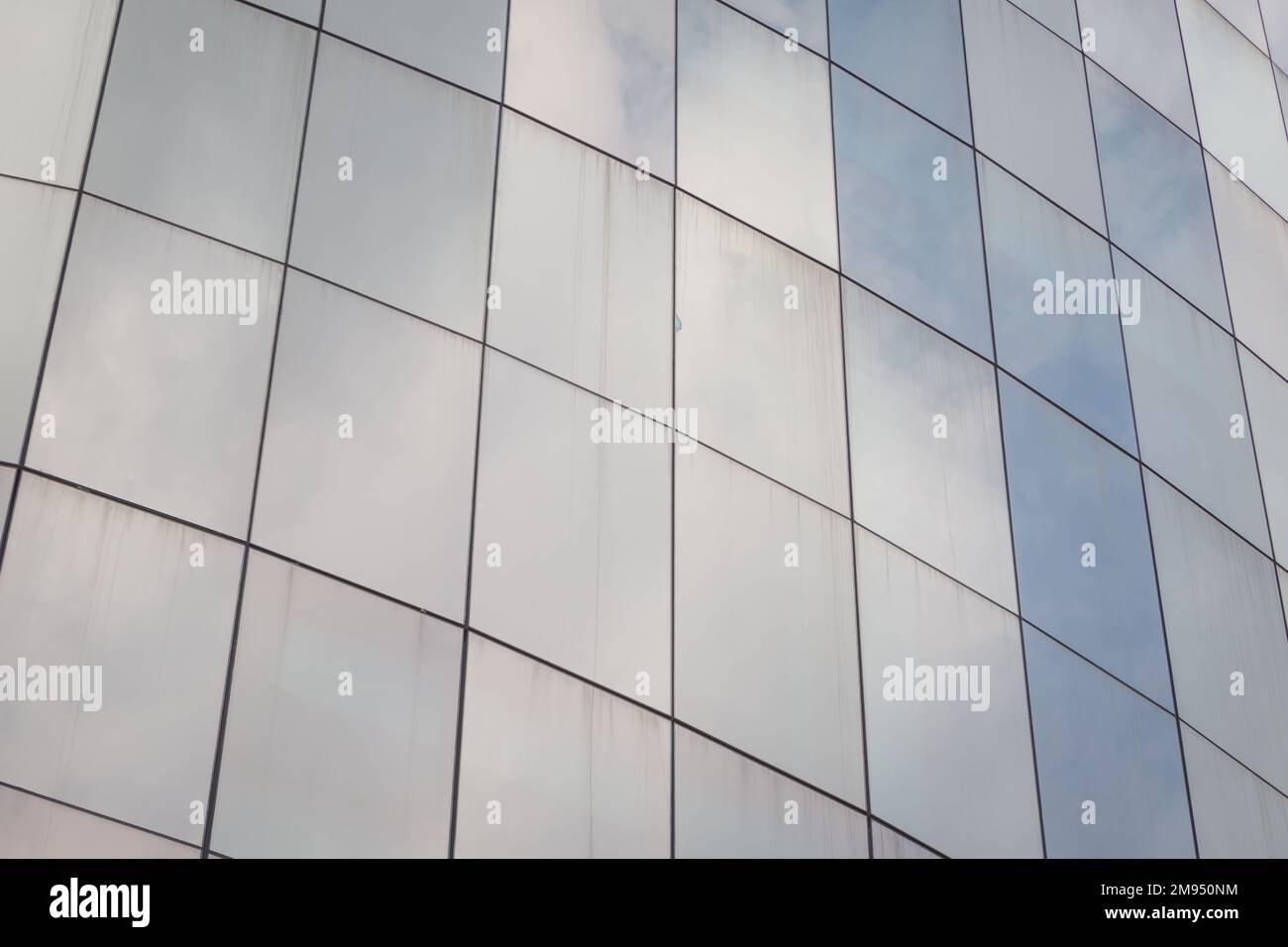 Blue glass of windows building background Stock Photo - Alamy