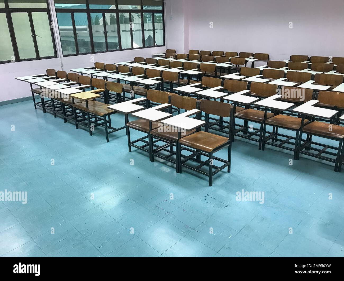Wooden chairs in the classroom background Stock Photo - Alamy