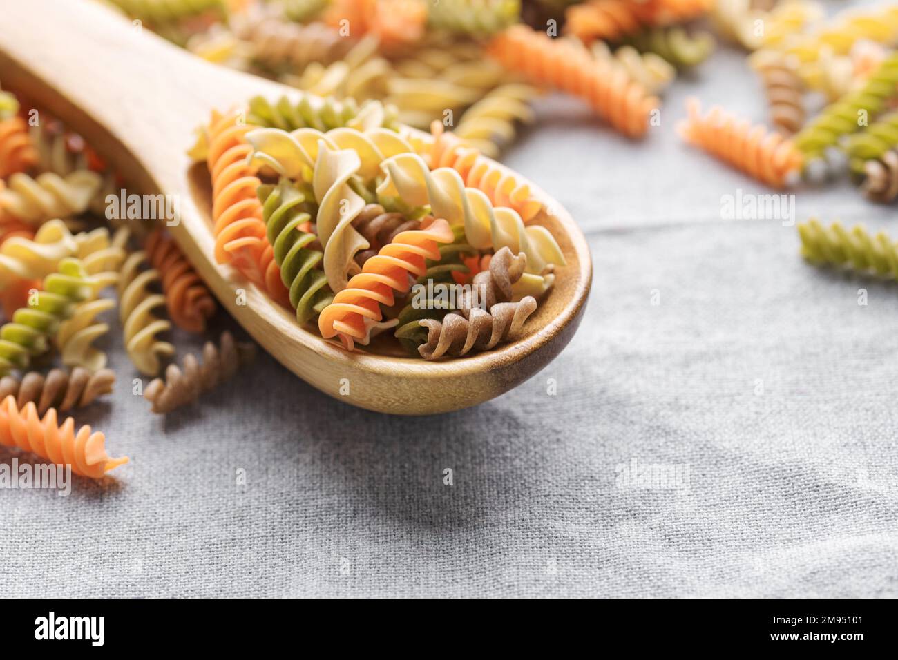 A variety of fusilli pasta made from different types of legumes, green ...