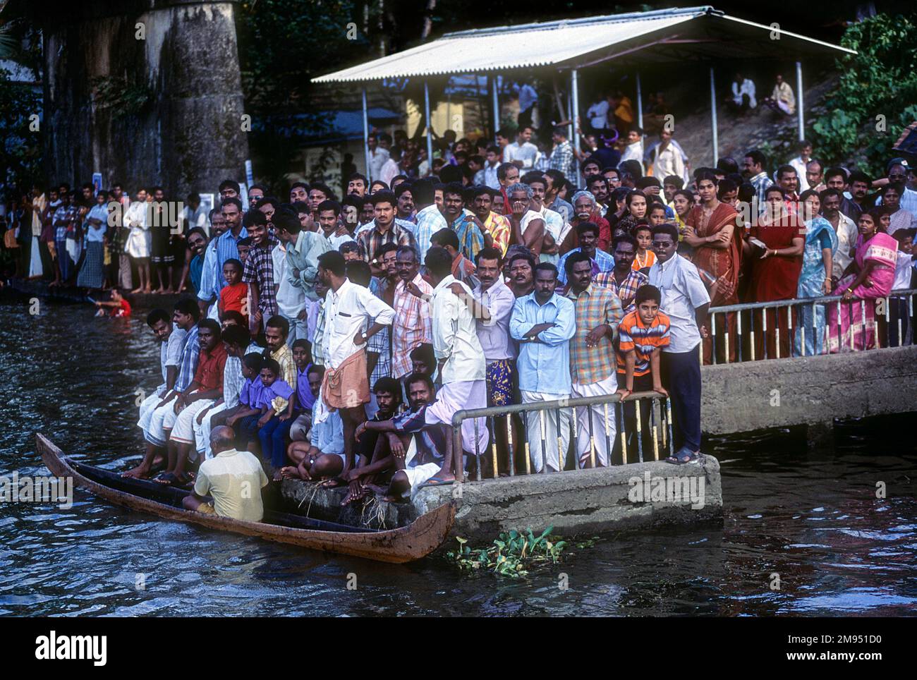 Crowded people waiting for boat at boat jetty, Backwaters of Allappuzha ...