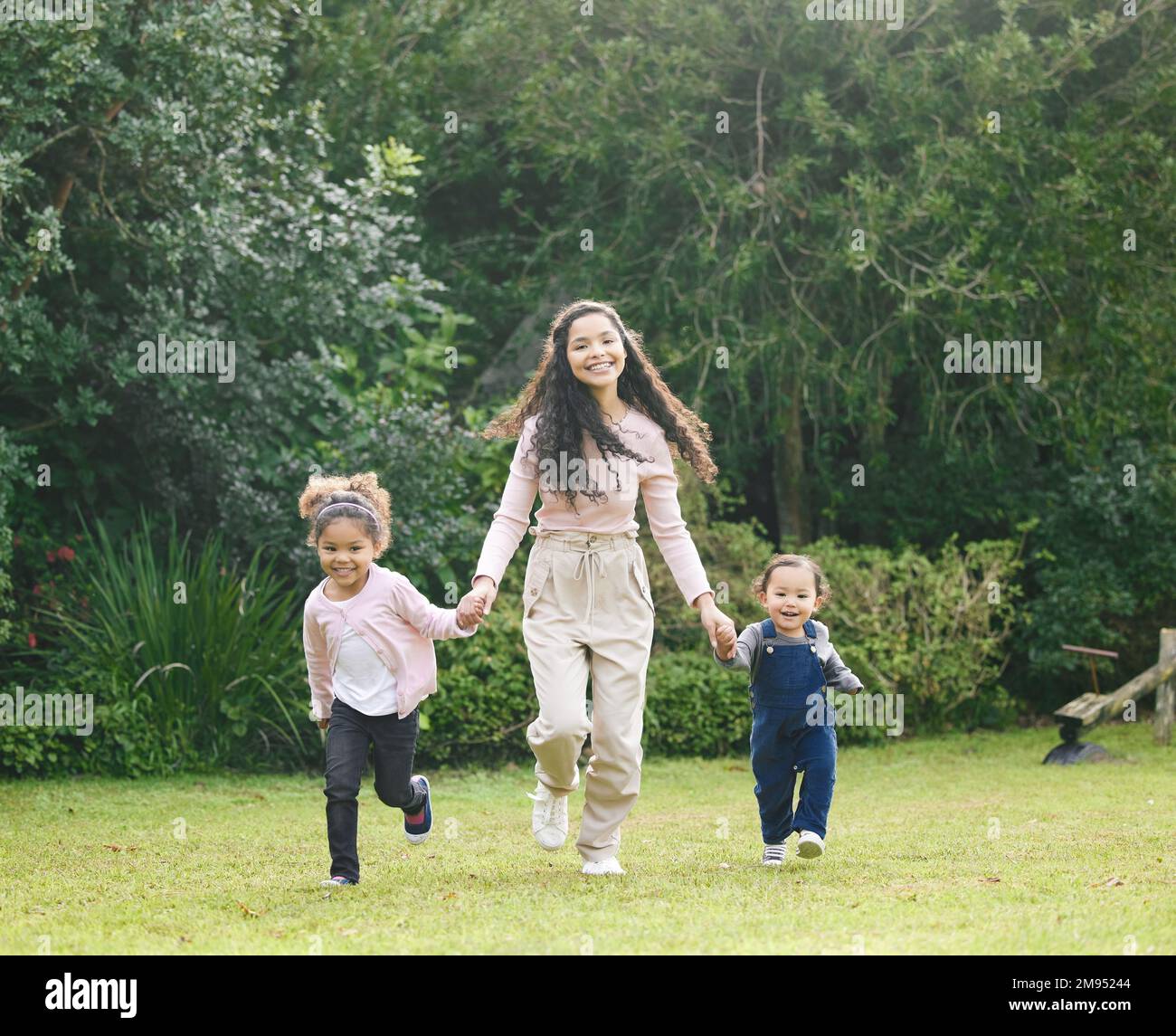Children learn how to learn as they play. Portrait of a mother and her ...