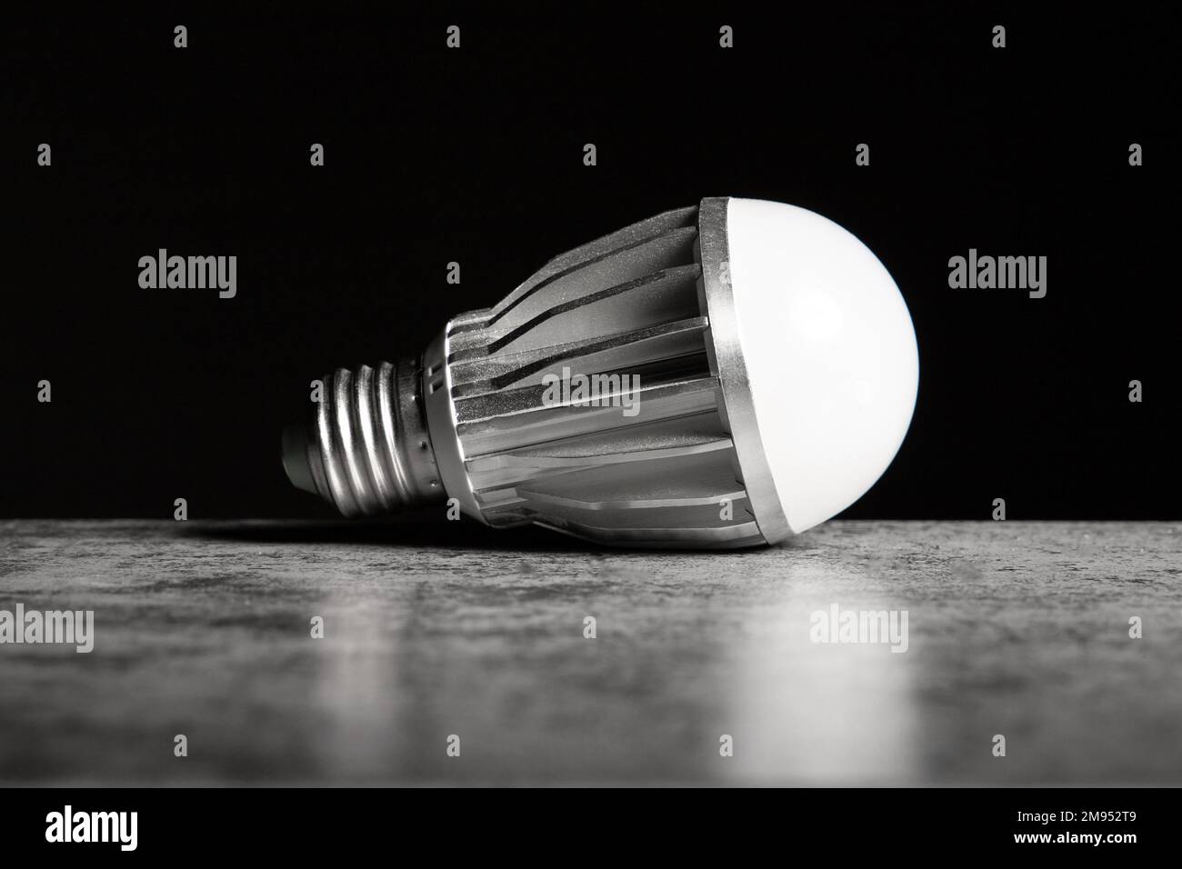 LED energy-saving lamp with aluminum radiator and E27 screw cap base on ...