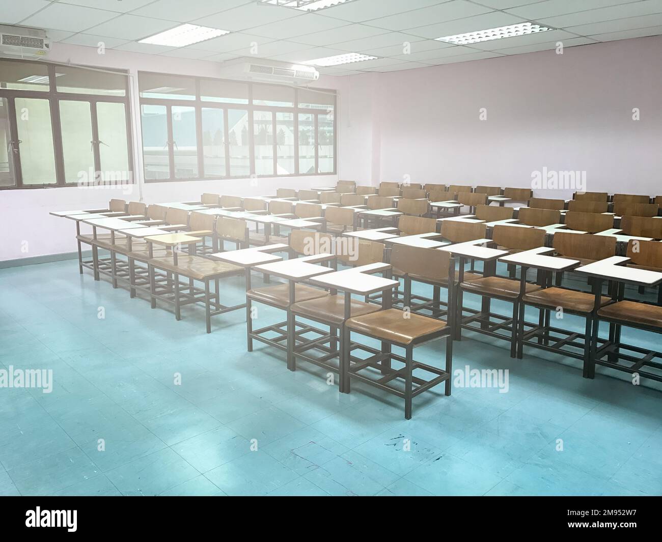 Wooden chairs in the classroom background Stock Photo - Alamy