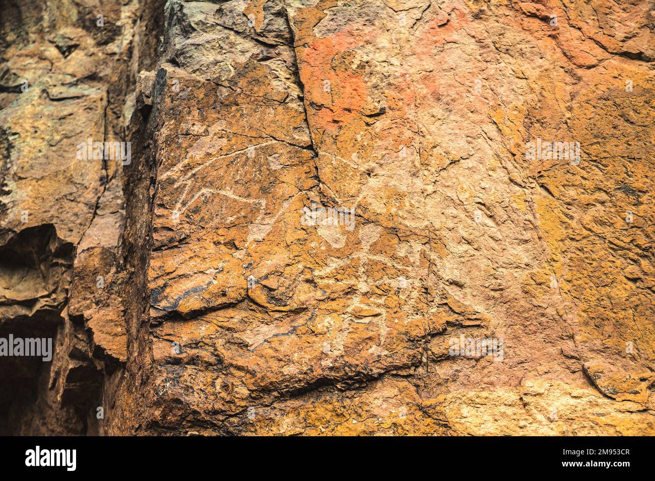 Rock paintings of ancient cavemen in Central Asia Stock Photo - Alamy