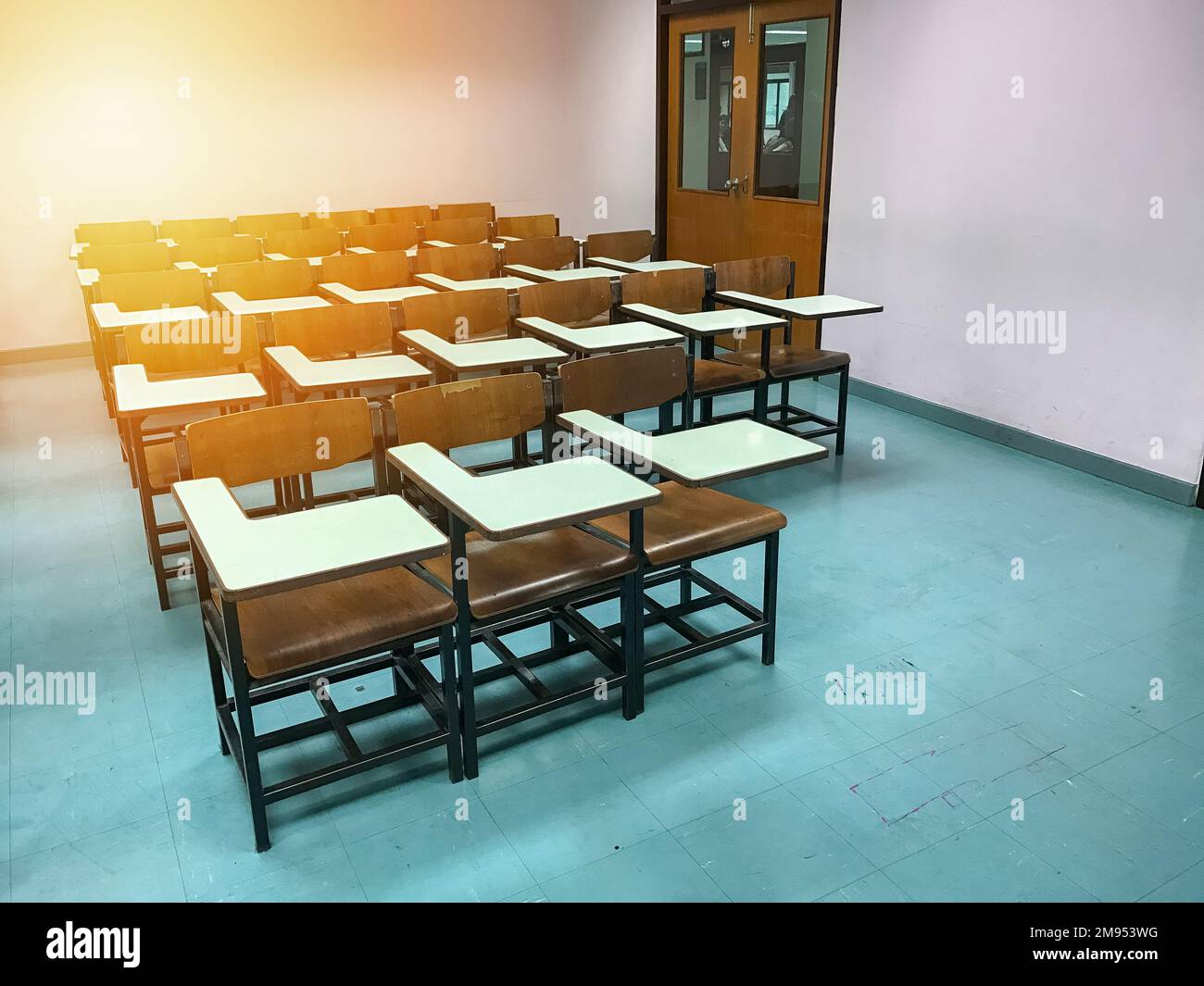 Wooden chairs in the classroom background Stock Photo - Alamy