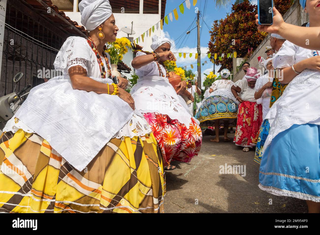 A view of Candomble members in traditional clothes during religious ...