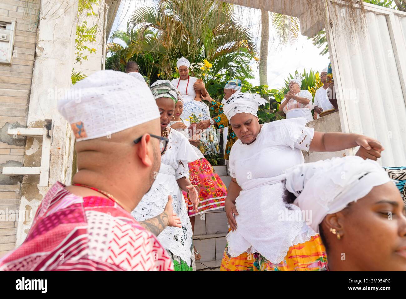A view of Candomble members in traditional clothes during religious ...