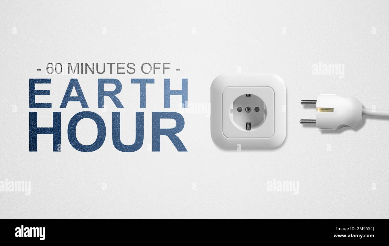 Electricity cable and plug connect. Earth Hour Concept Stock Photo - Alamy