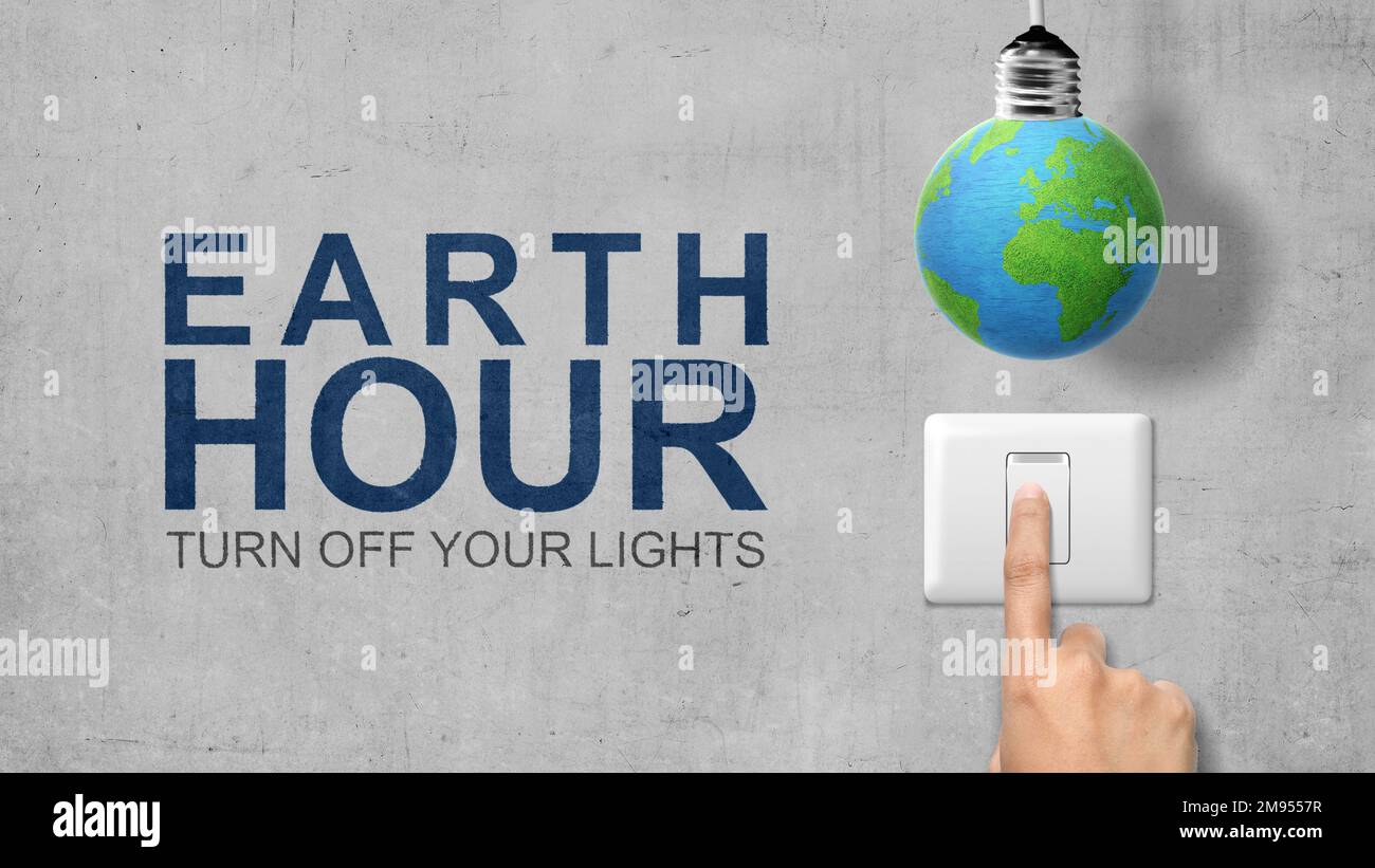 Human hand turning off the switch. Earth Hour Concept Stock Photo - Alamy