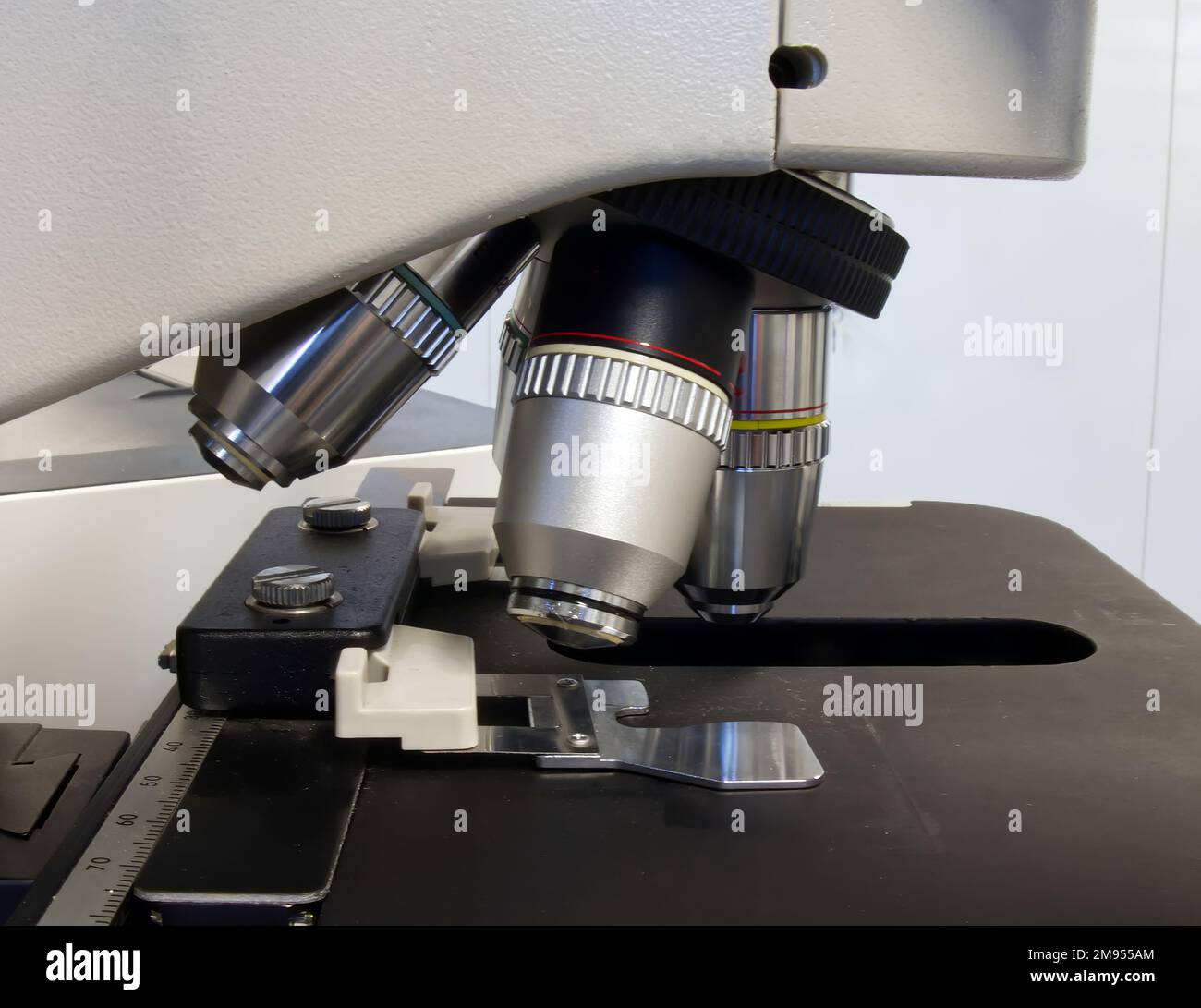 Laboratory microscope with different lenses closeup. Scientific and ...