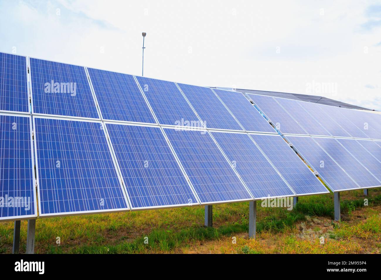 Ground mounted Solar power photovoltaic panels on grass. Solar power ...