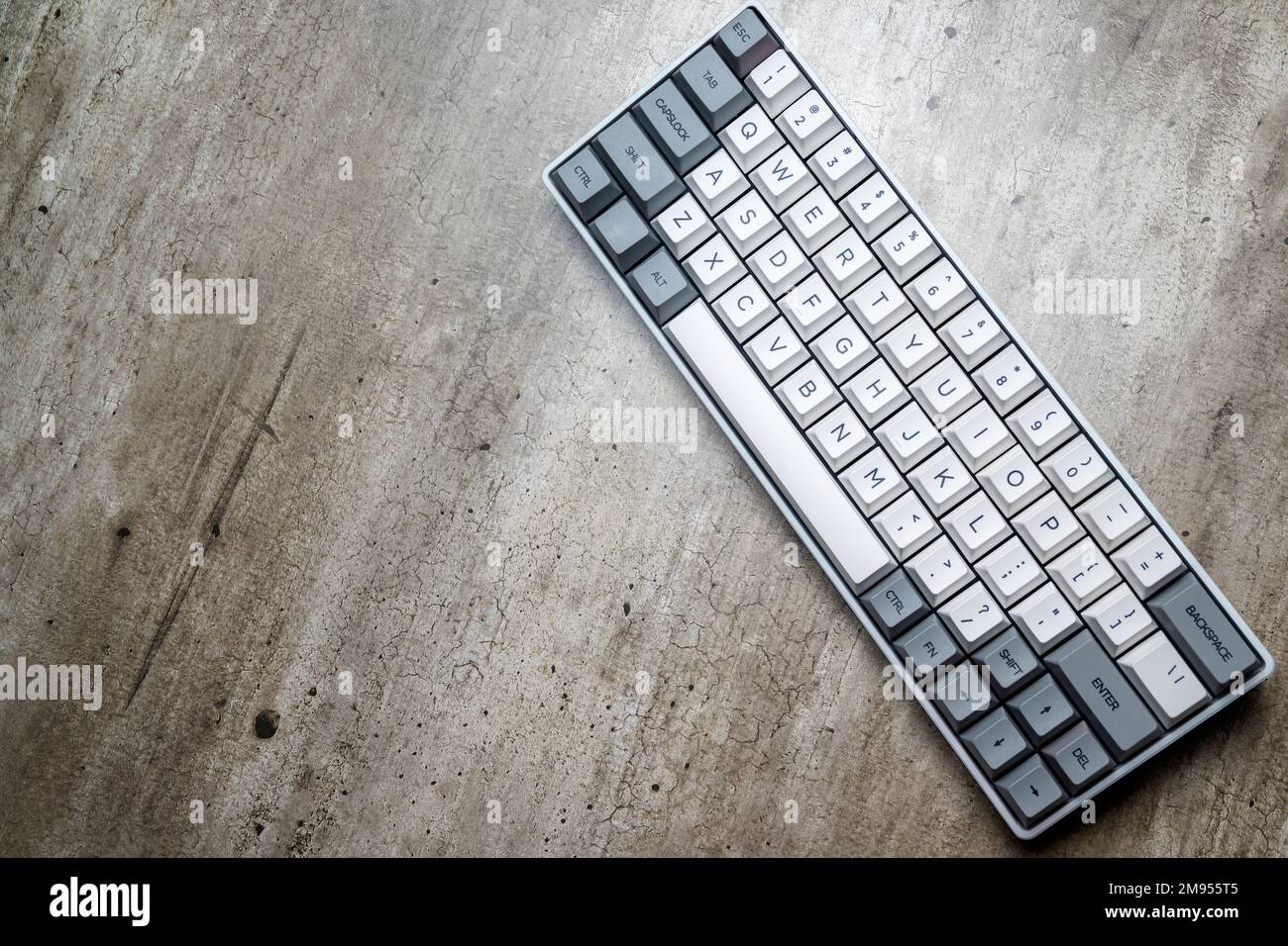 The mechanical keyboard on textured background Stock Photo - Alamy