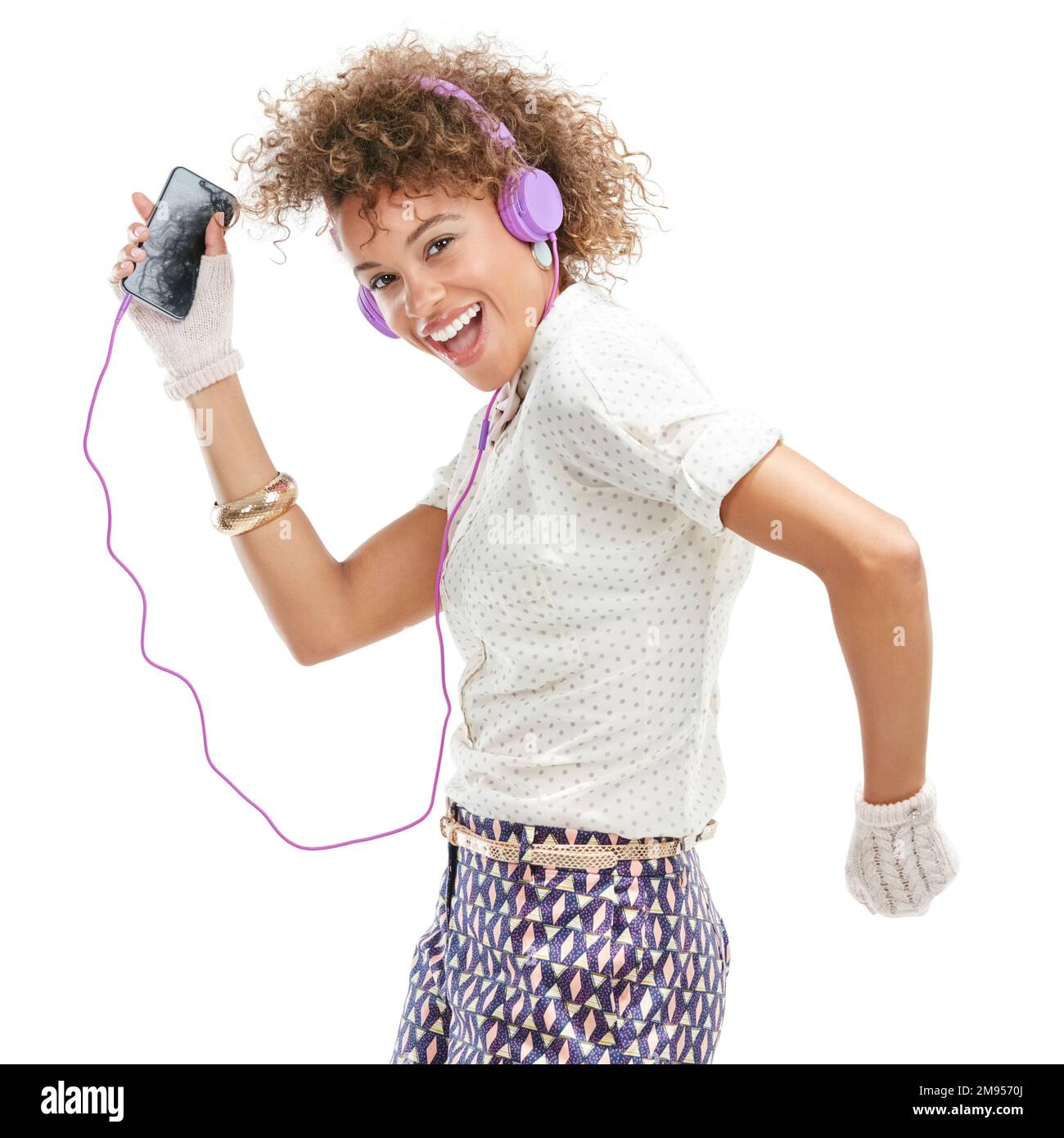 Black woman, phone and dancing to fun music, podcast or radio against a ...