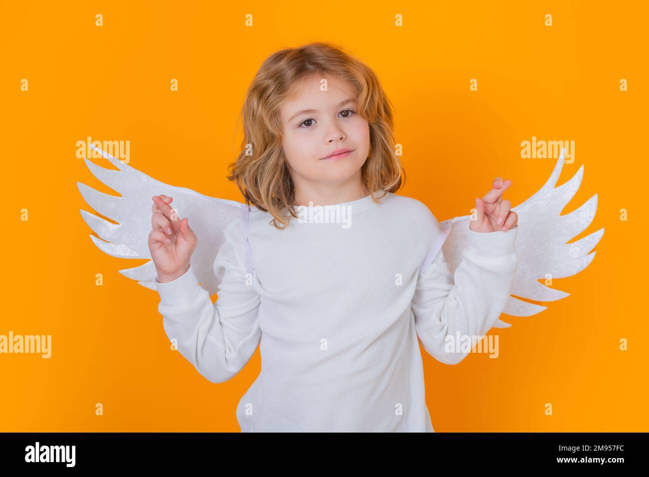 Child angel crossed fingers with lucky and hope, good luck. Valentines ...