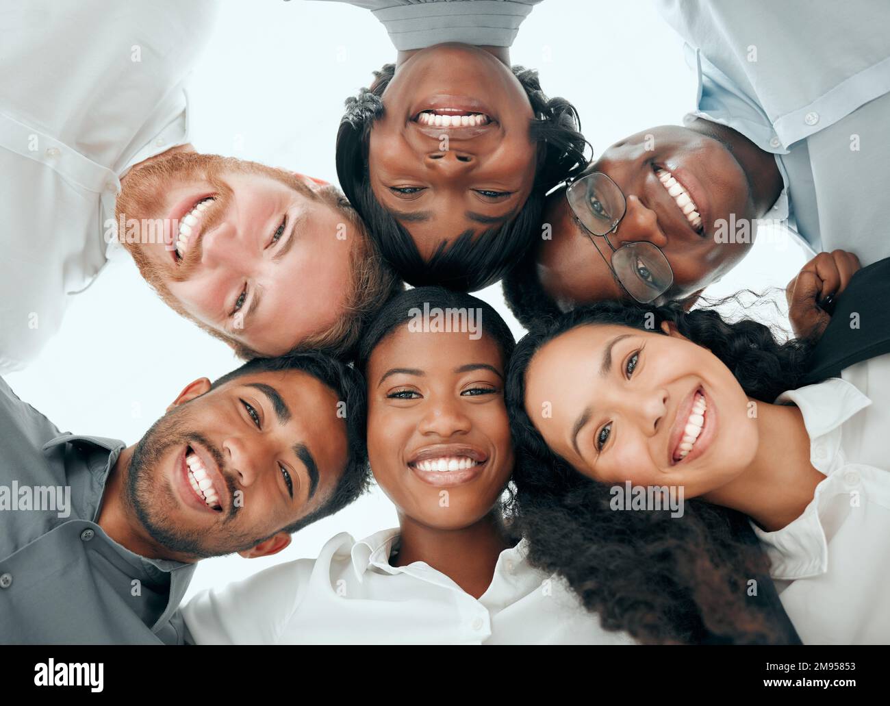 Were a force when we work together. Low angle portrait of a diverse ...