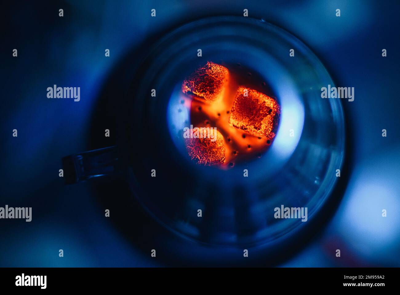 Hookah hot coals for smoking shisha and leisure. Bowl with tobacco and ...