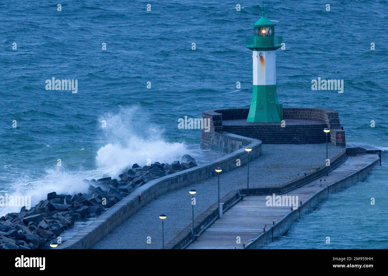 Sassnitz, Germany. 17th Jan, 2023. Waves break before sunrise at the ...