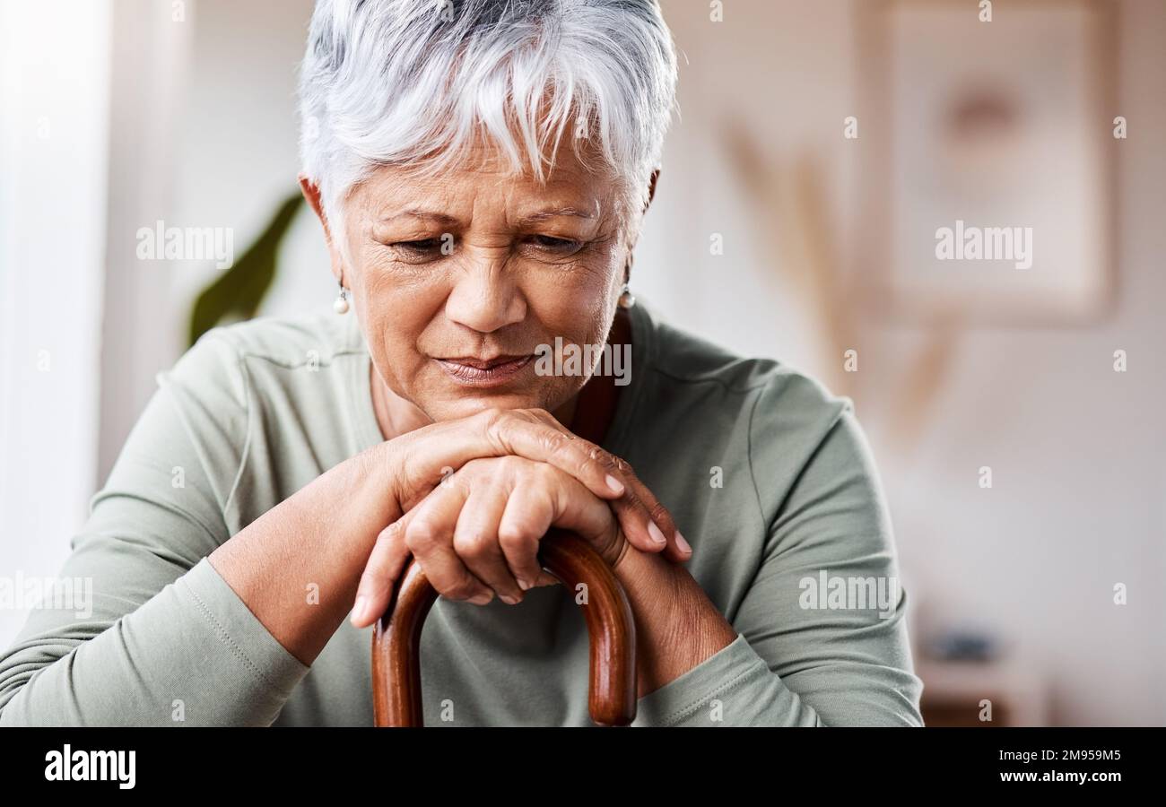 Deafening screams from the devil to give up. a senior woman leaning in ...