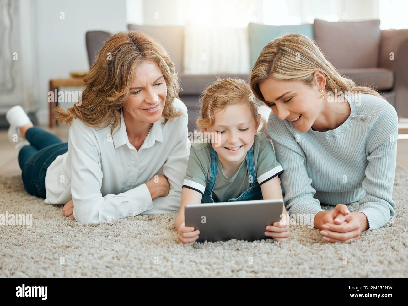 Releasing our inner child as well. a little girl lying on the living ...