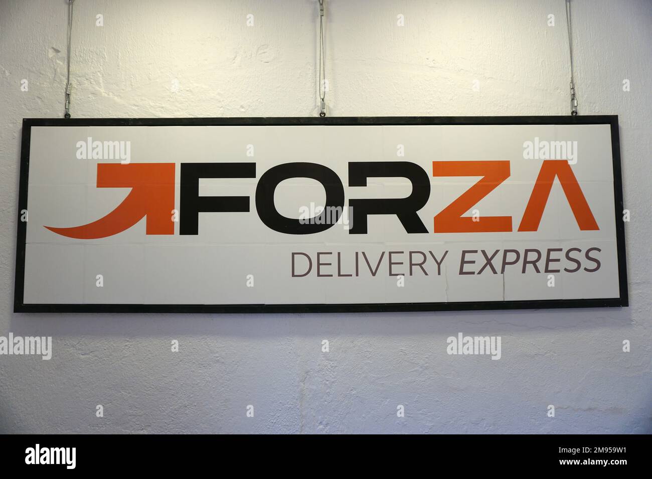 Sign of Forza Delivery Express in Antigua Stock Photo - Alamy