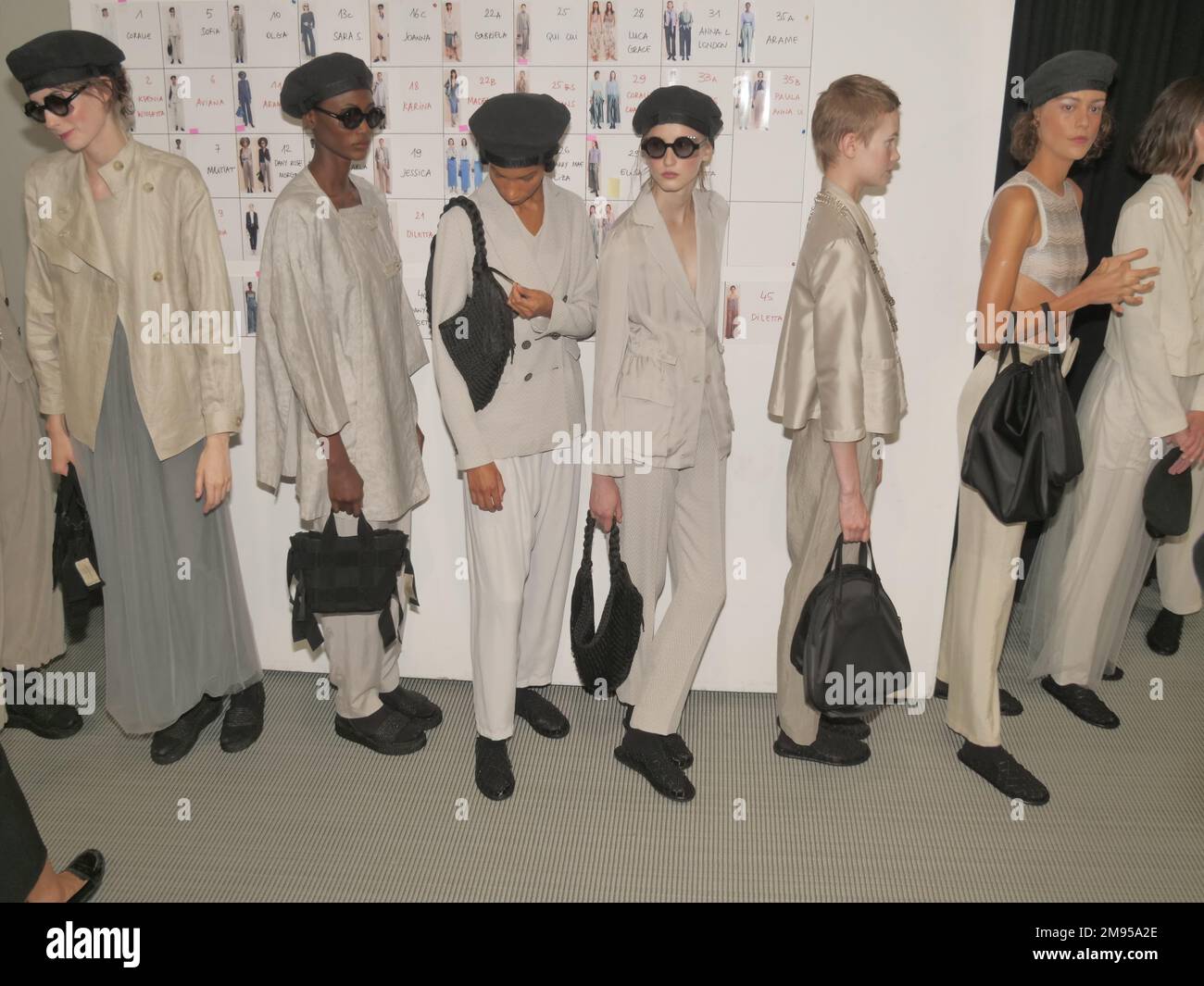 Emporio Armani models backstage before the fashion show in Armani silos ...