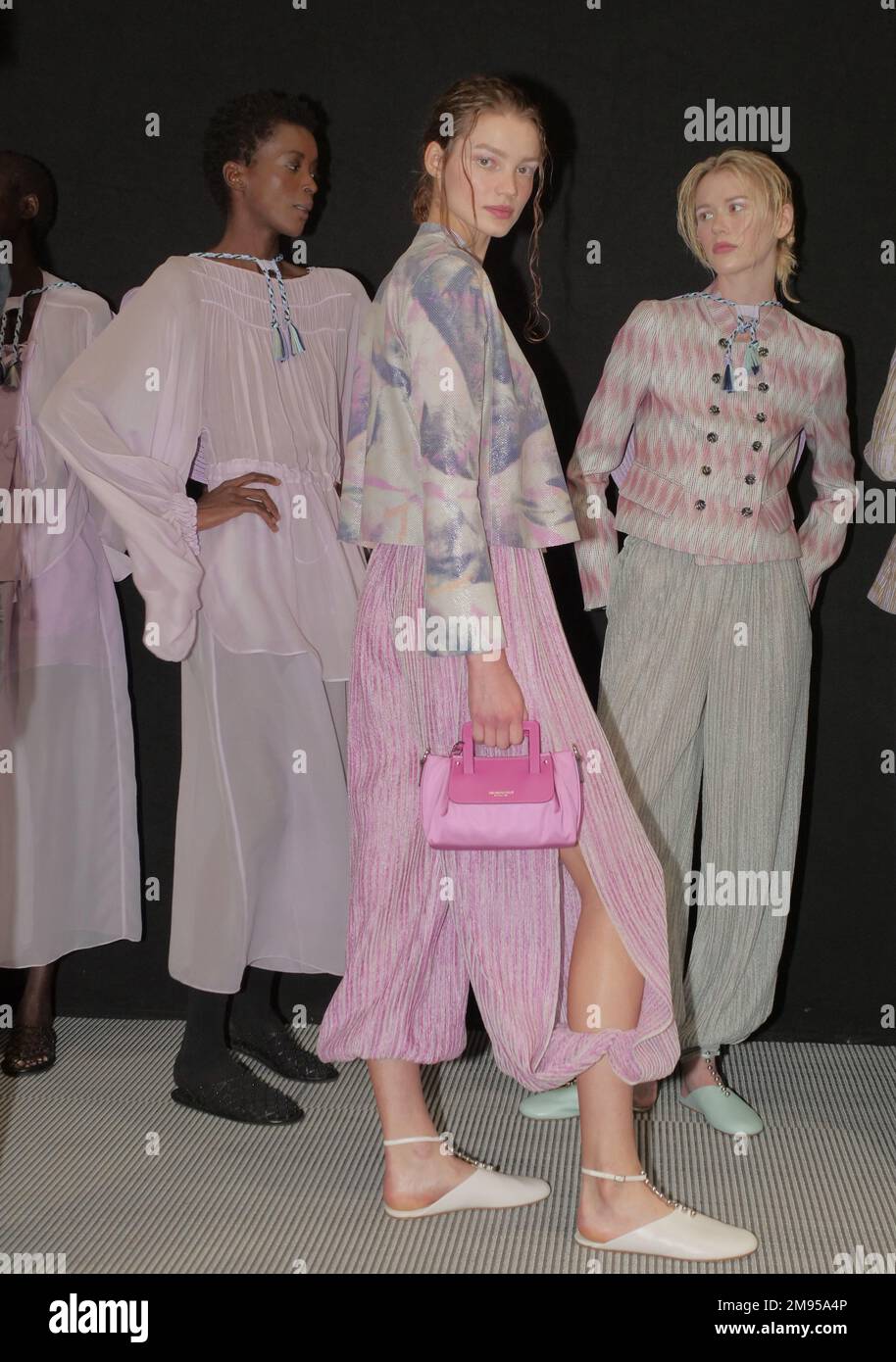Emporio Armani models backstage before the fashion show in Armani silos ...