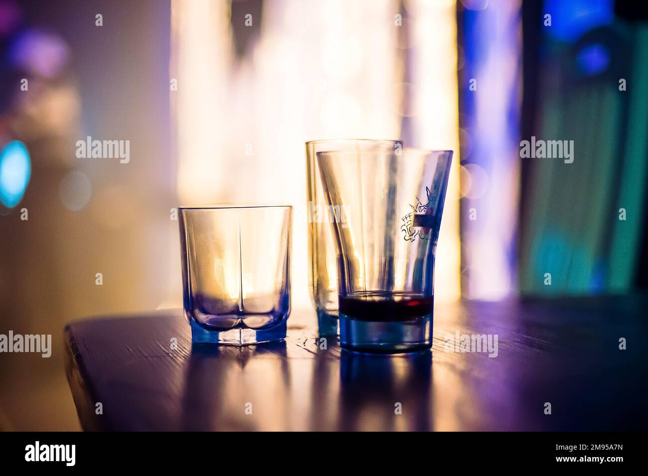 empty glasses of vodka at a party in a nightclub Stock Photo - Alamy