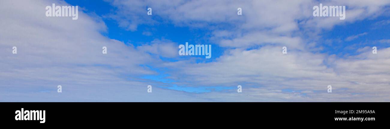 Image of a partly cloudy and partly clear sky during the day without ...