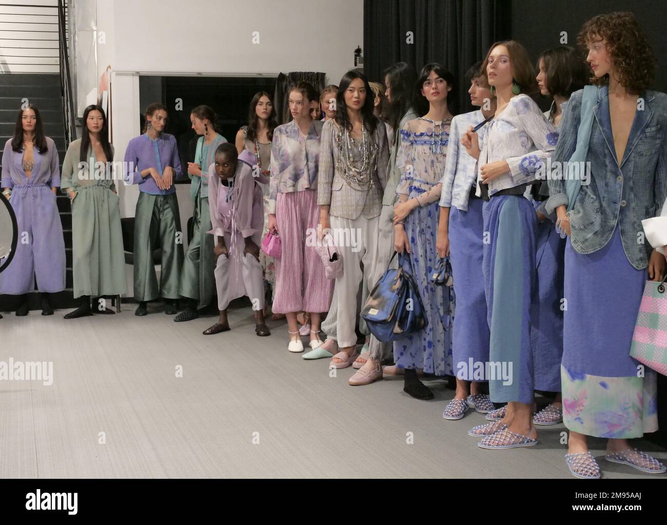 Emporio Armani models backstage before the fashion show in Armani silos ...