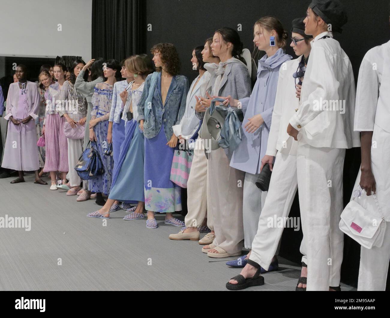 Emporio Armani models backstage before the fashion show in Armani silos ...