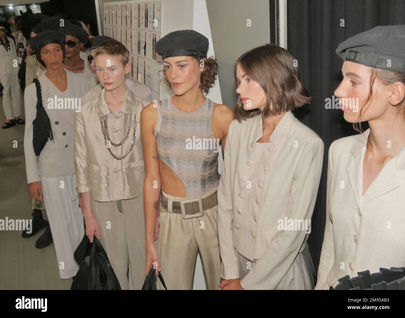 Emporio Armani models backstage before the fashion show in Armani silos ...