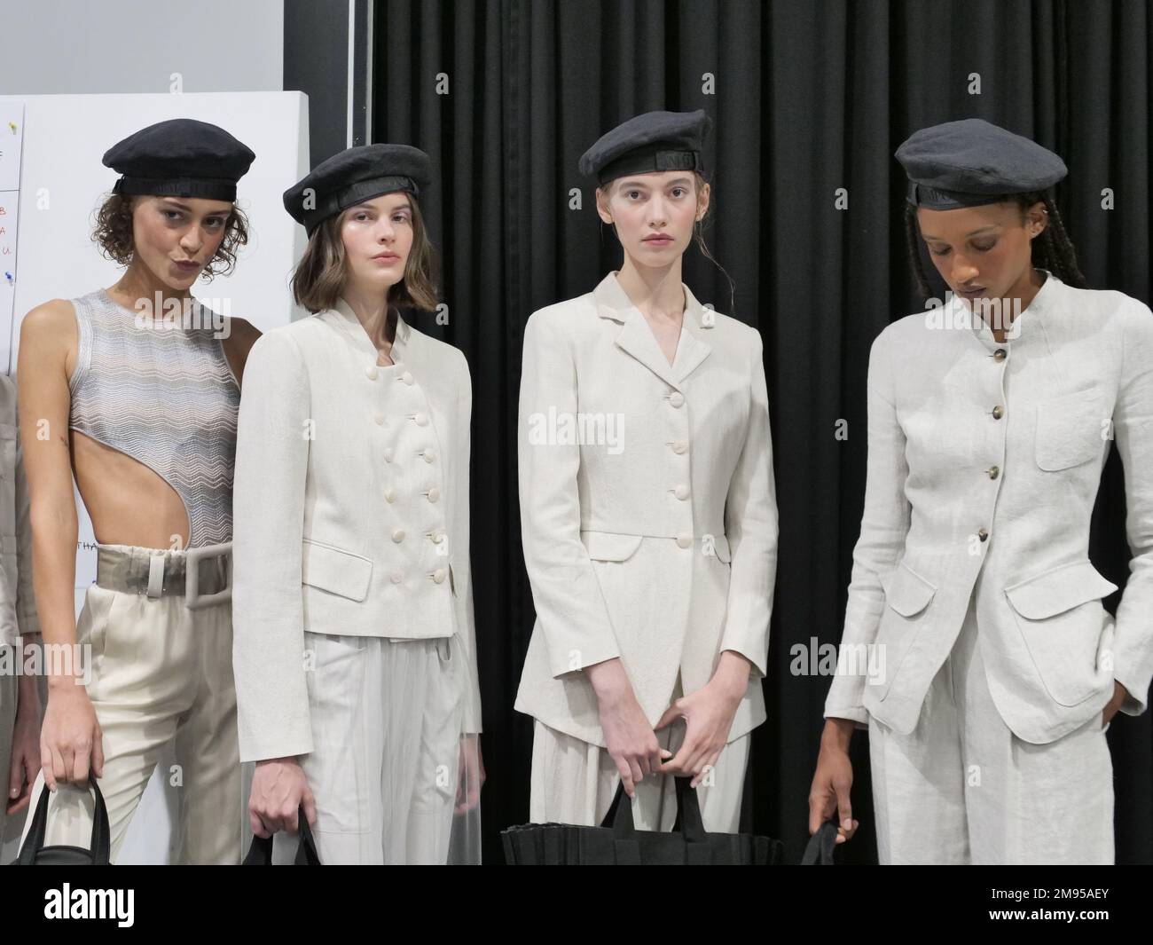 Emporio Armani models backstage before the fashion show in Armani silos ...