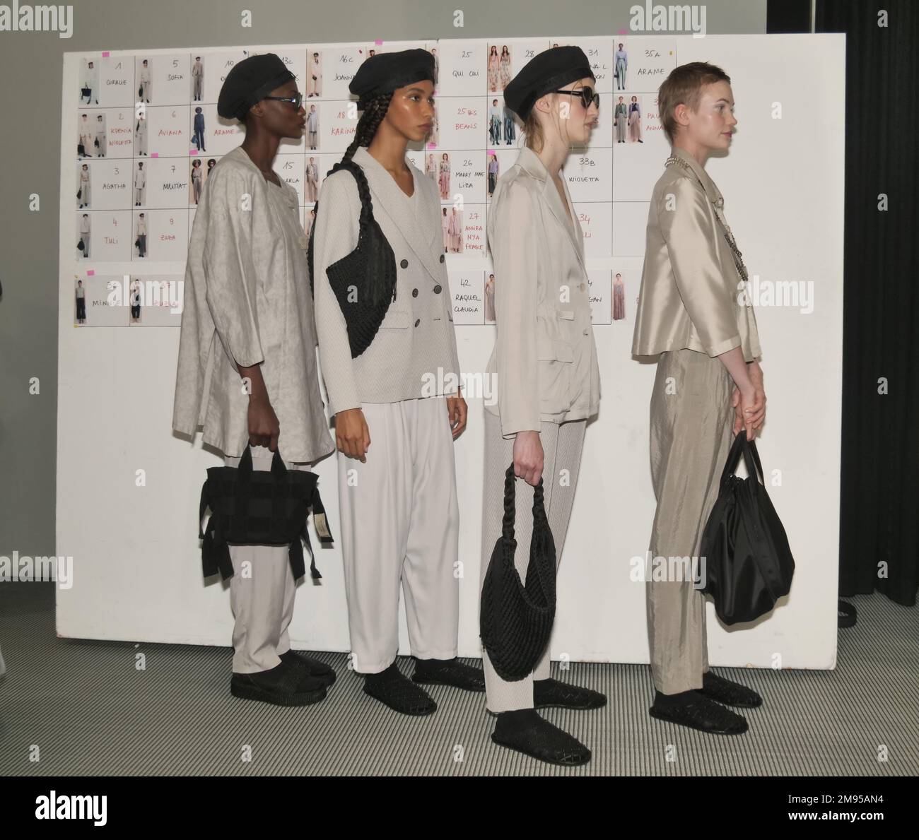 Emporio Armani models backstage before the fashion show in Armani silos ...