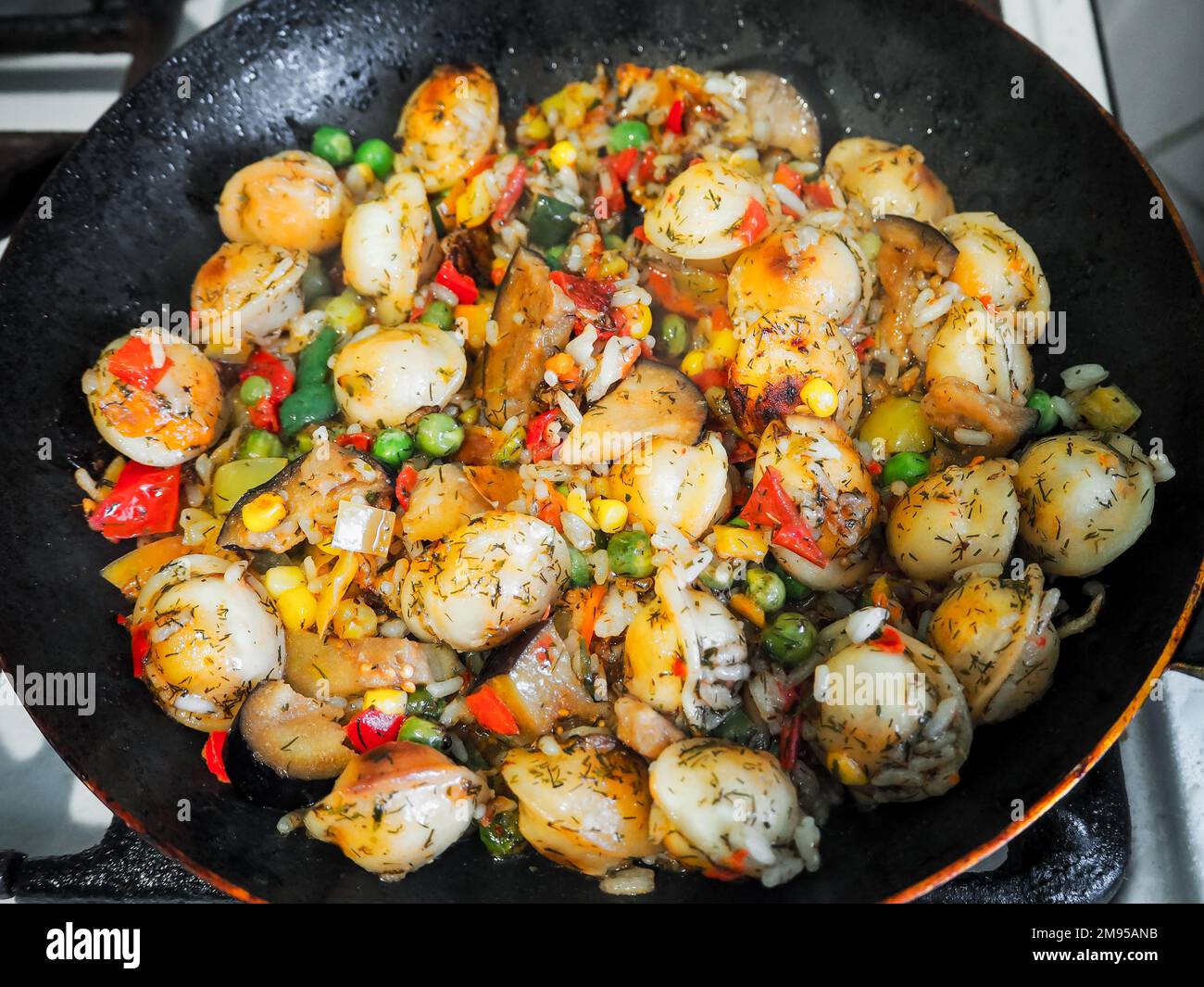 steamed dumplings with fresh vegetables and spices in a pan in the ...