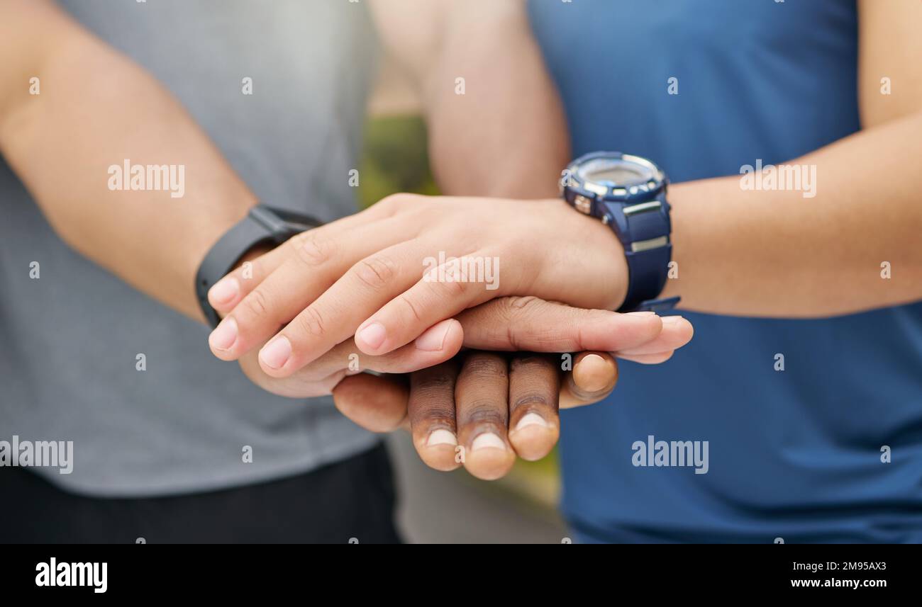 Time to level up. Closeup shot of two unrecognisable men joining their ...