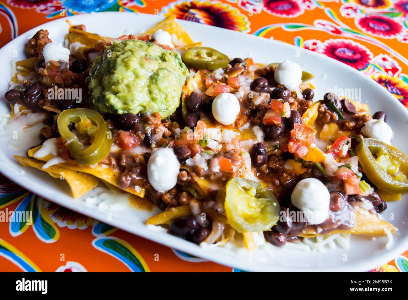 Nachos with guacamole. Nachos are a dish of Mexican origin, which ...