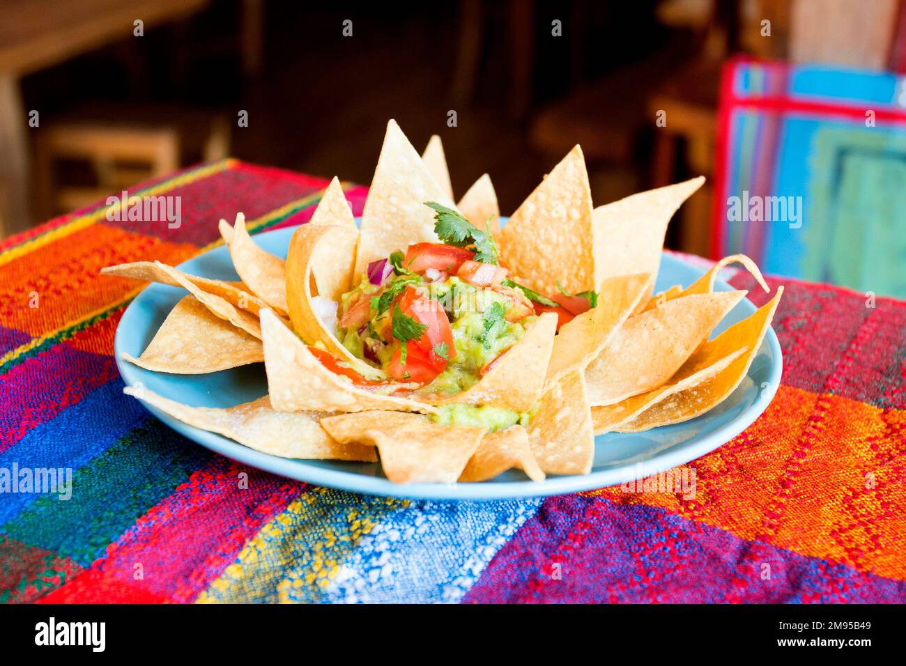 Nachos with guacamole. Nachos are a dish of Mexican origin, which ...