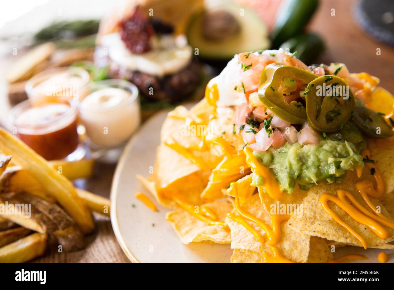 Nachos with guacamole. Nachos are a dish of Mexican origin, which ...