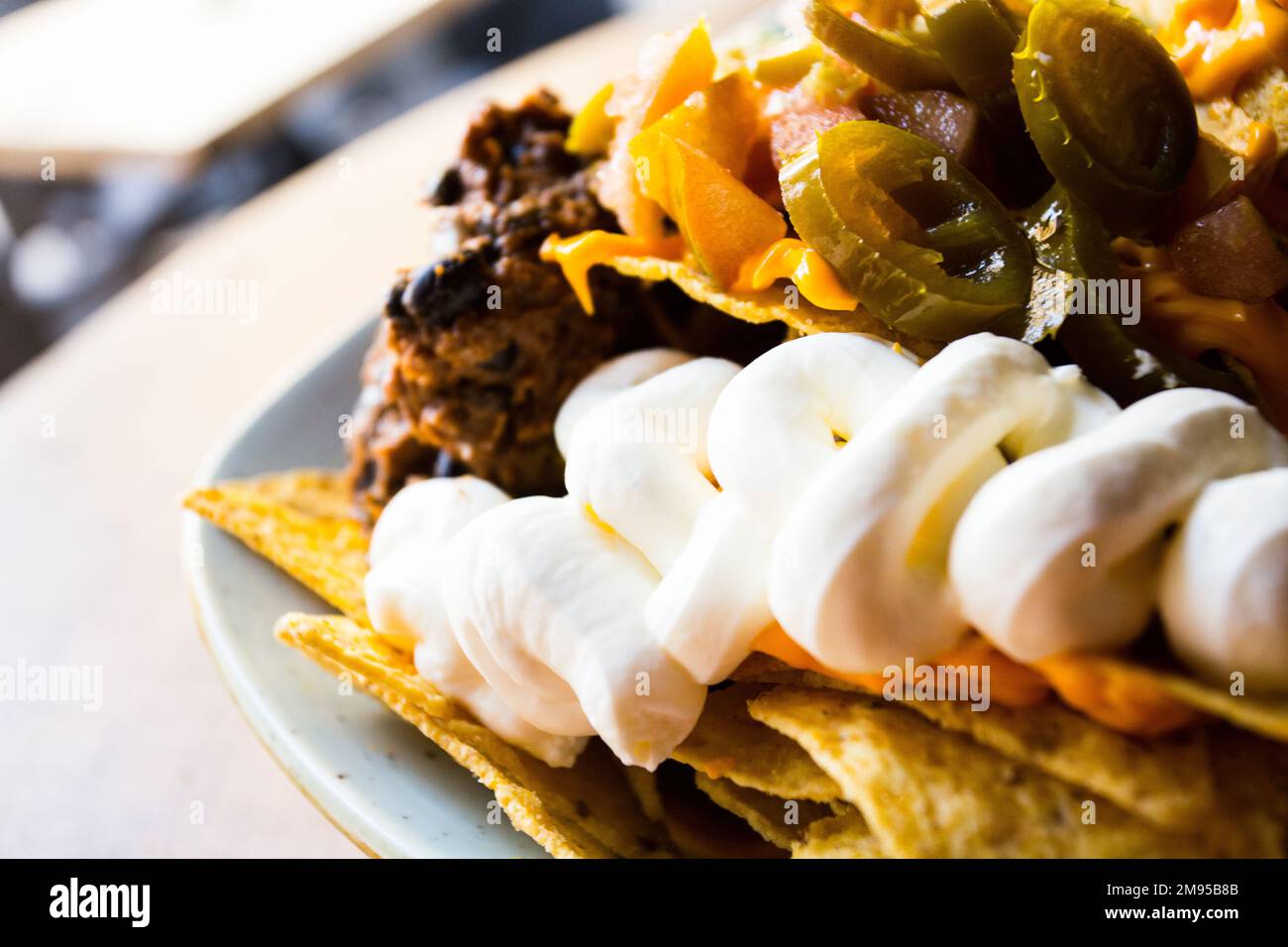 Nachos with guacamole. Nachos are a dish of Mexican origin, which ...