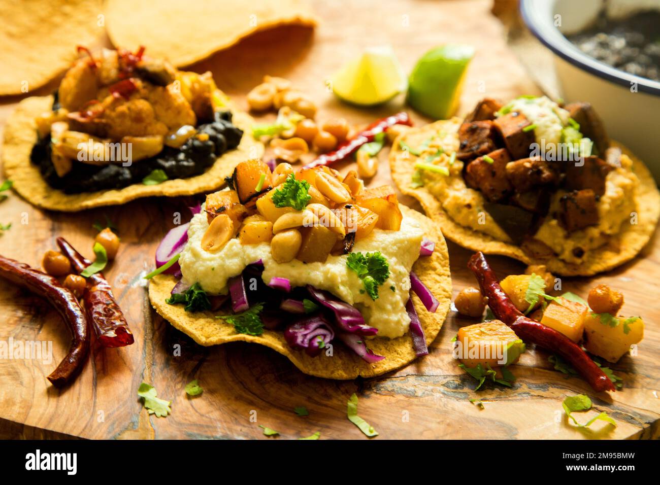 Vegetarian tostadas with hummus. Tostada, name given to various dishes ...