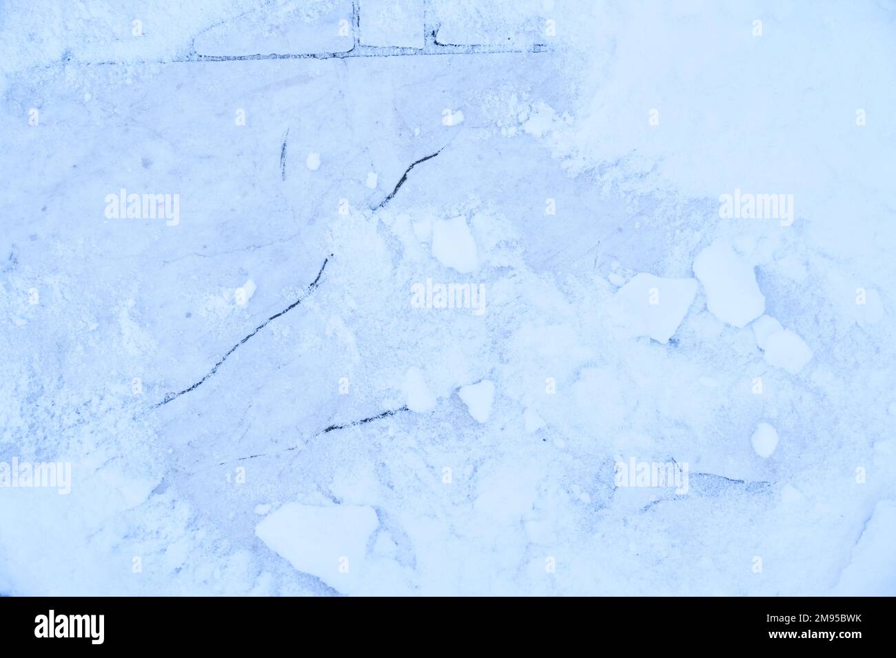 A piece of cracked snow. Winter ice frost, background of frozen marble ...