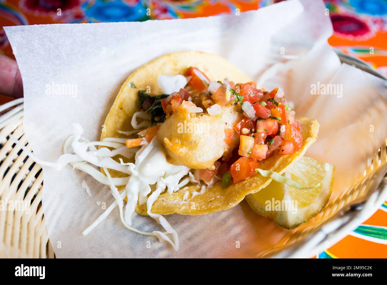 Shrimp tacos. A taco is a traditional Mexican food consisting of a ...