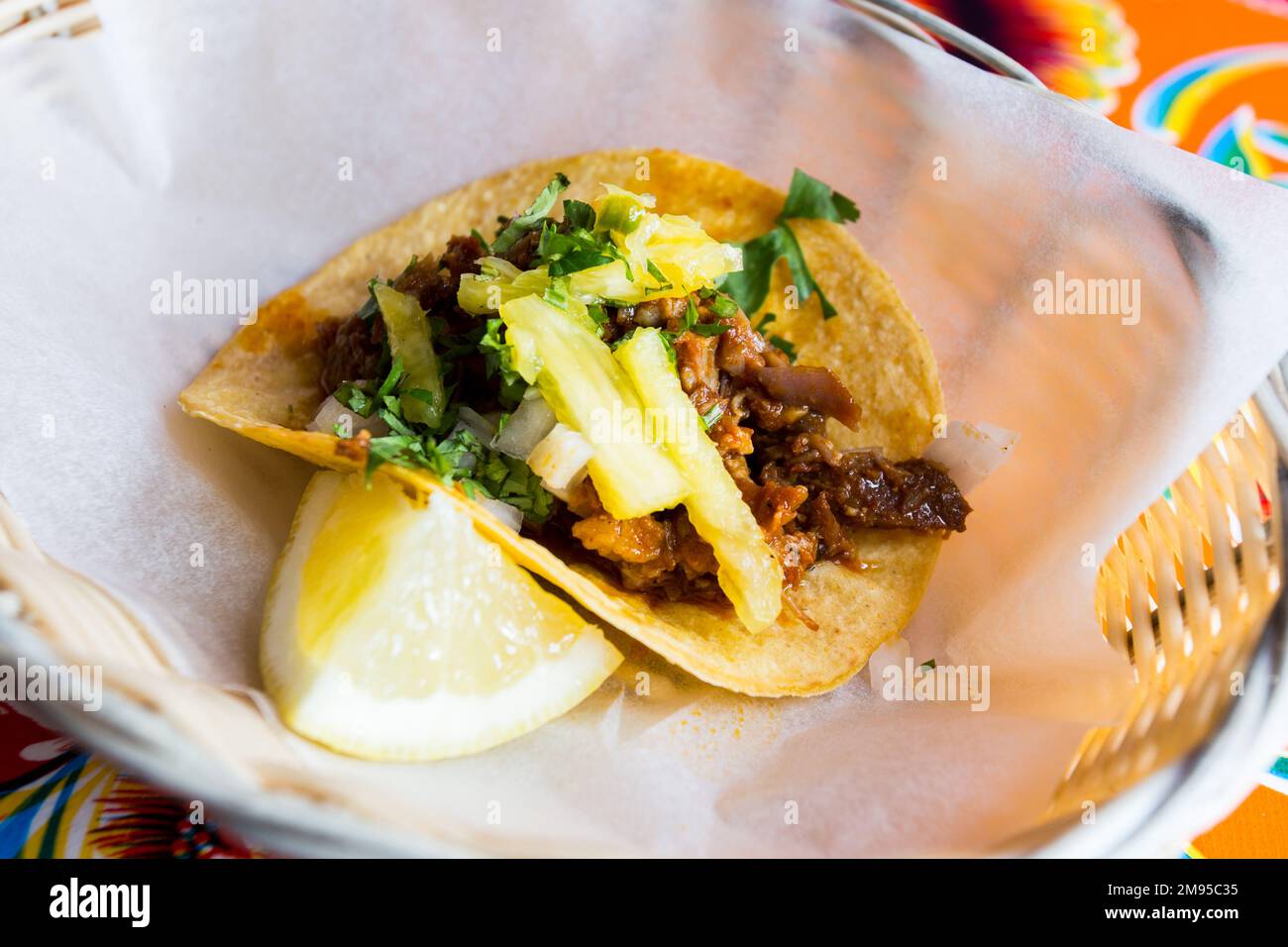 Pork tacos. A taco is a traditional Mexican food consisting of a small ...