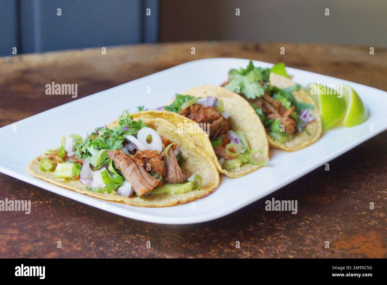 Pork tacos. A taco is a traditional Mexican food consisting of a small ...