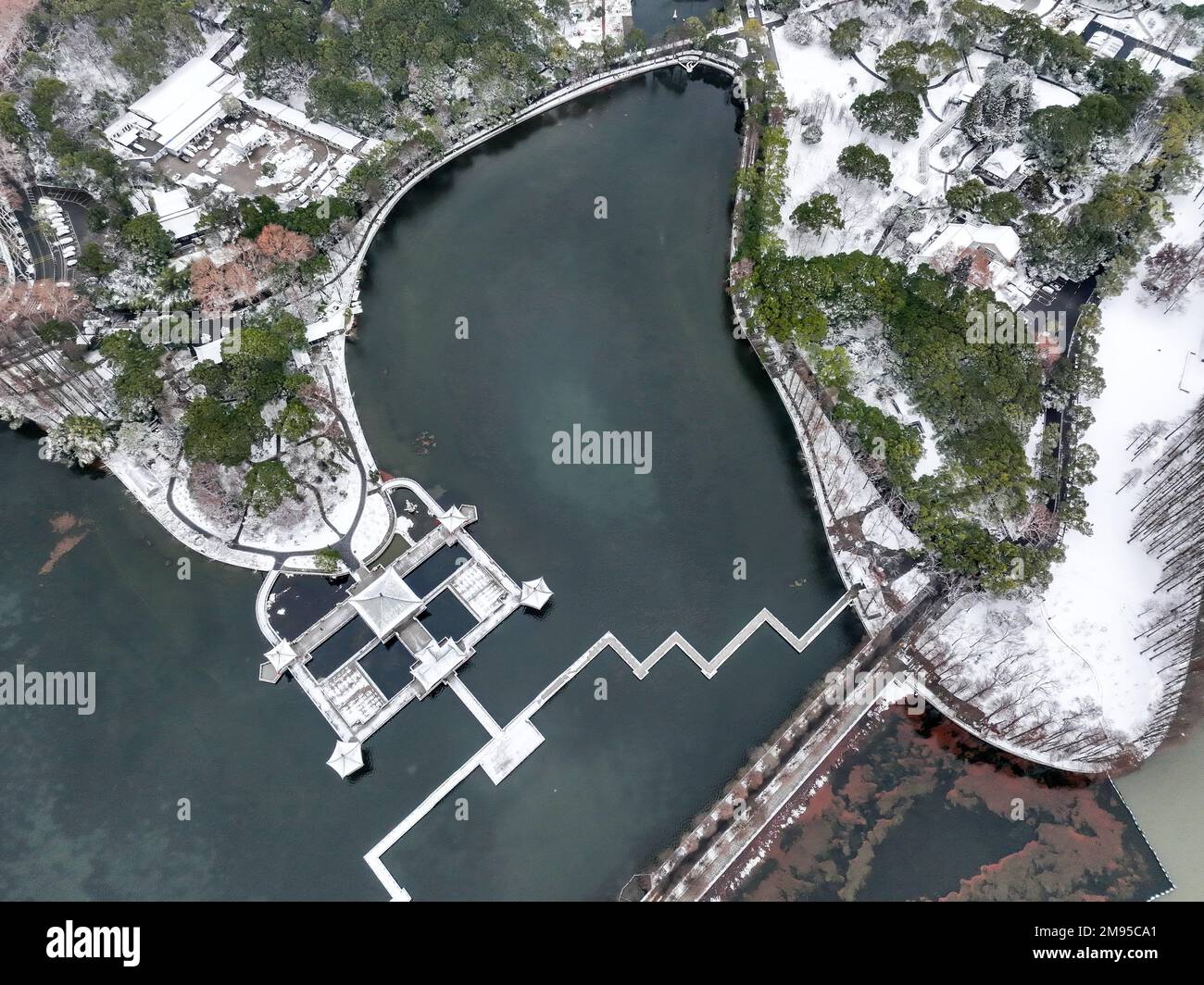 Aerial photo shows the snow scenery of East Lake Scenic Area in Wuhan ...